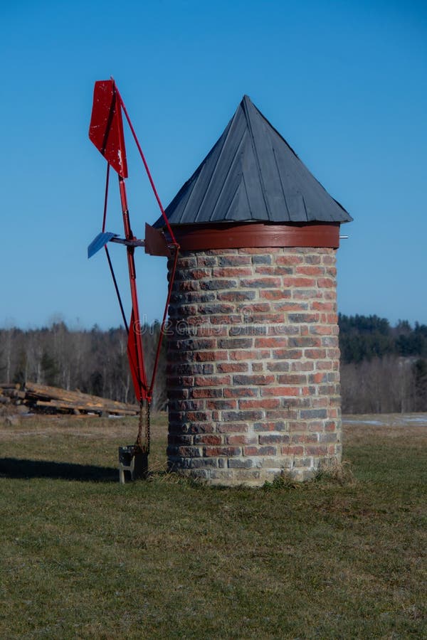 Small windmill in a field stock photo. Image of small - 236199746