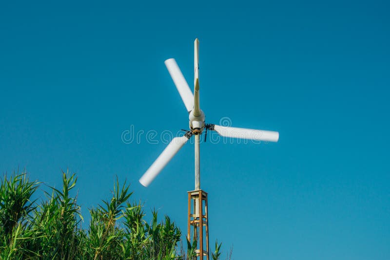 Small windmill in movement stock image. Image of industry - 144199145