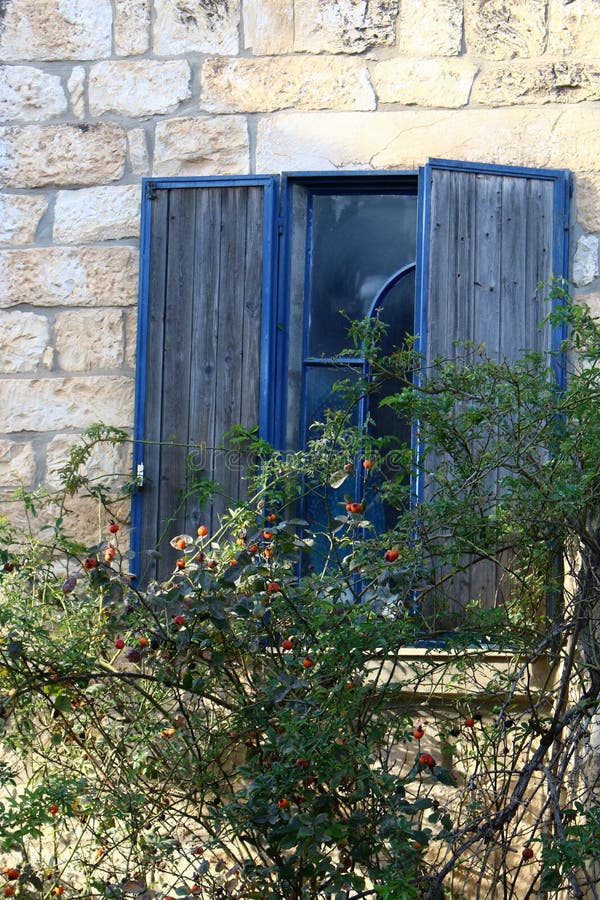 Small window in a big city stock image. Image of balcony - 133826565
