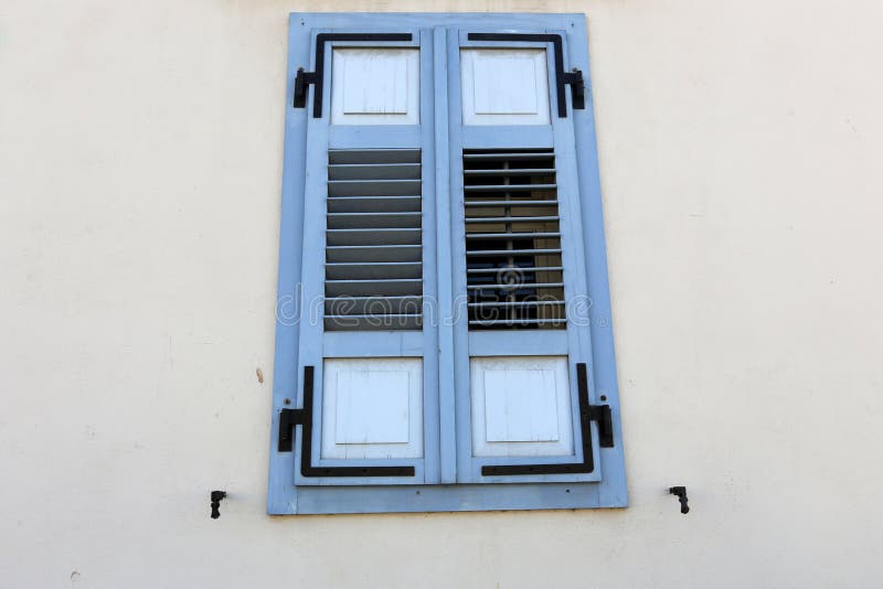 Small window in a big city stock photo. Image of roof - 133826580