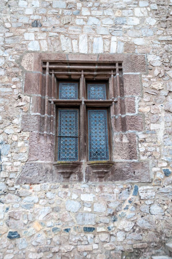 Small window of a castle stock photo. Image of design - 238811966