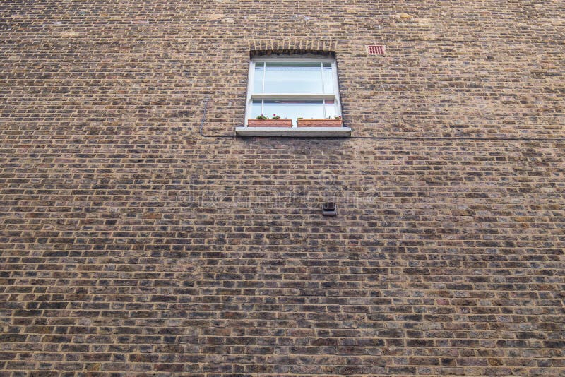 Small Window in a Large Brick Wall Stock Image - Image of high, british ...