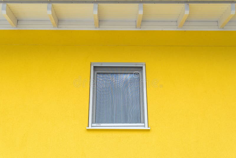 Small Window on a Yellow Wall Stock Photo - Image of lonely, background ...