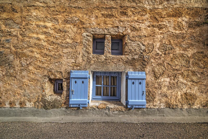 Small Windows in a Rustic Wall Stock Photo - Image of external ...