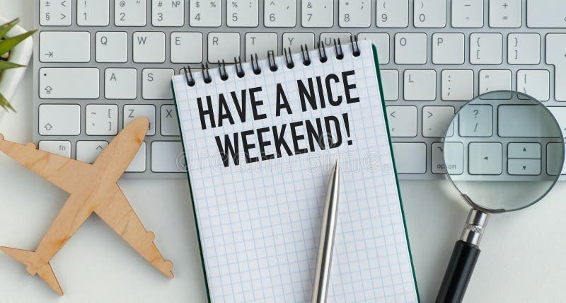 A Small Wooden Airplane is on Top of a Notebook with the Words Have a ...