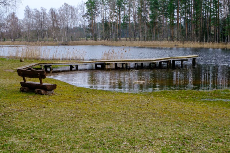 A Small Wooden Boardwalk in the Lake. Bathing Place Stock Photo - Image ...