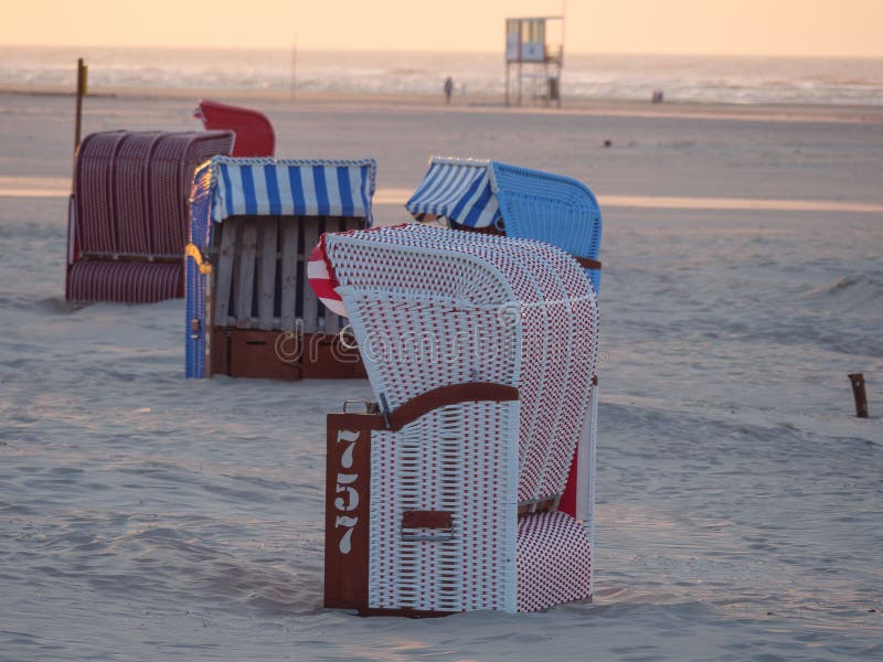 Small Wooden Boxes on the Seashore in Juist, Germany Stock Photo ...