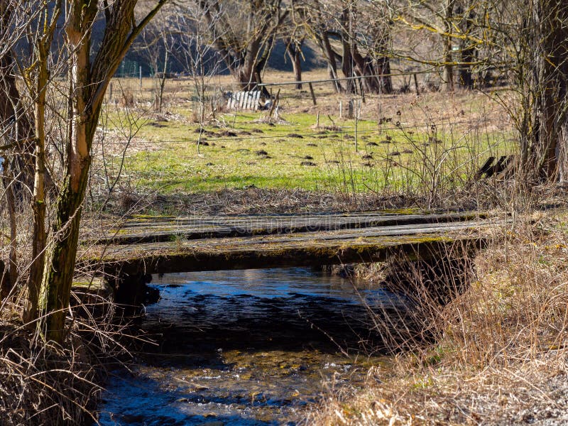 Small Wooden Bridge Over a Creek in Spring Stock Image - Image of brook ...