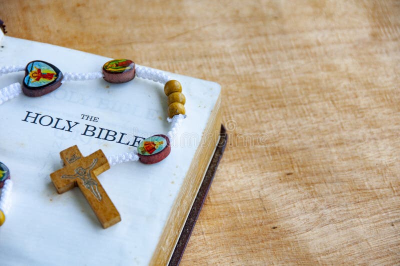 A Small Wooden Cross beside Scripture Invites Deep Reflection on Christ ...
