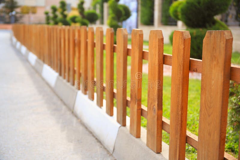 Small Wooden Fence on Sunny Day Outdoors, Closeup. Space for Text Stock ...