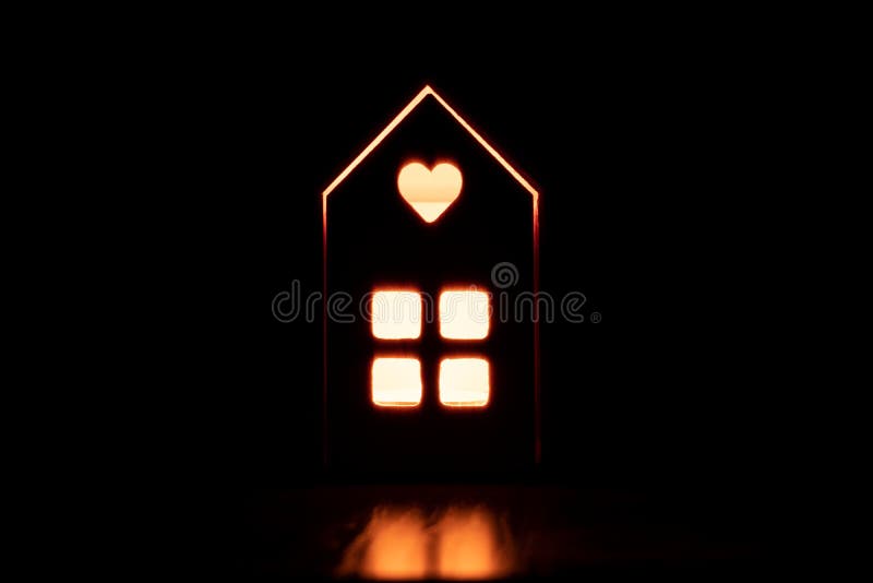 A Small Wooden House in the Dark with a Light in the Window, Light in ...