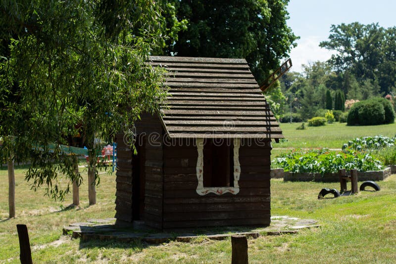 Small Wooden House with a Mill Stock Photo - Image of natural, roof ...