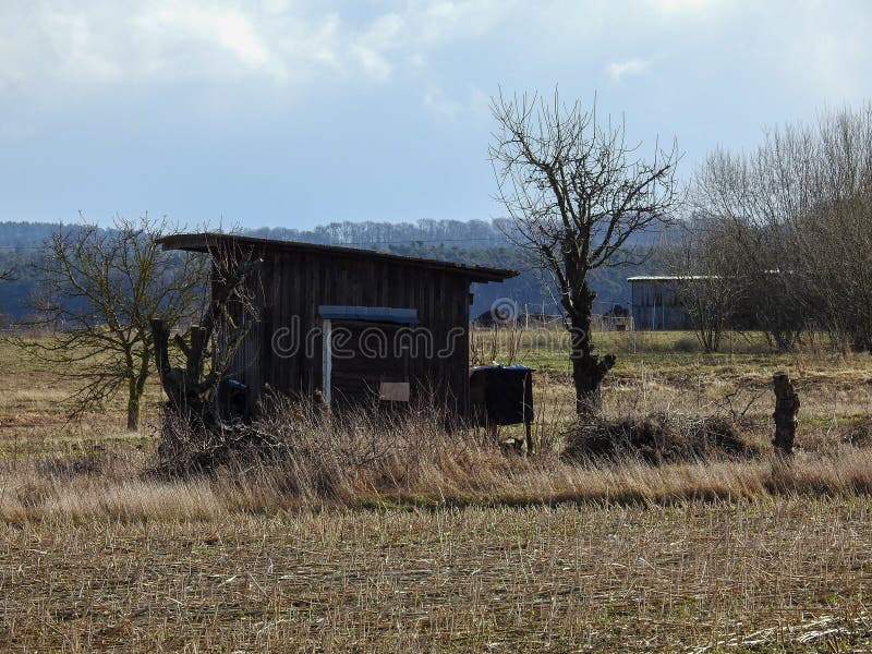 Small Wooden Hut in a Valley in the Countryside Stock Photo - Image of ...