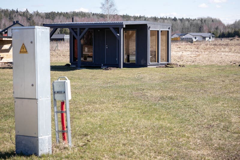 A Small Wooden Rest House with a Metal Electrical Box Stock Image ...