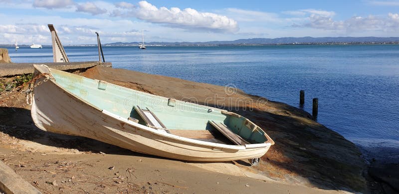 Old wooden rowboat stock photo. Image of beach, blue - 179159500