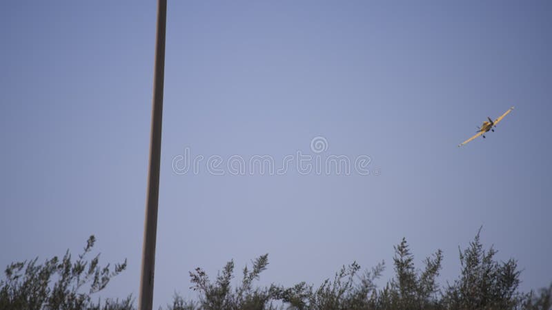 Yellow Airplane Flying Over the Field Stock Footage - Video of plane ...