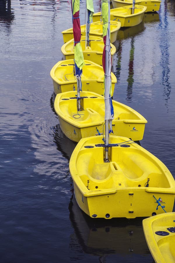 Yellow boats stock photo. Image of exercise, kayak, pond - 58644632