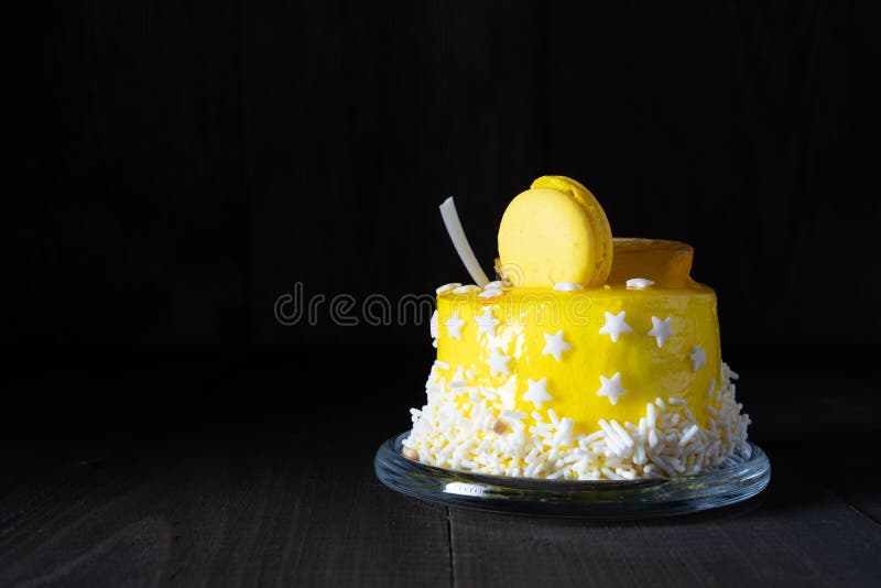 Small Yellow Cake for an Anniversary or Birthday in a Dark Key Stock ...