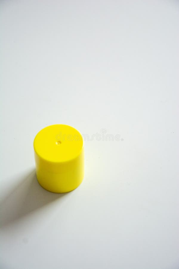 Yellow Cylindrical Object, Minimalist Background Stock Image - Image of ...