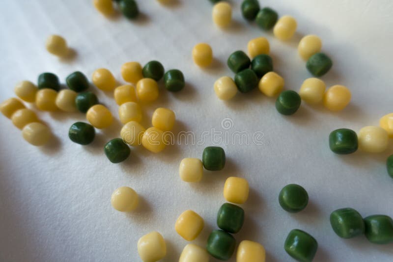 Small Yellow and Green Colored Candy Drops Stock Image - Image of snack ...