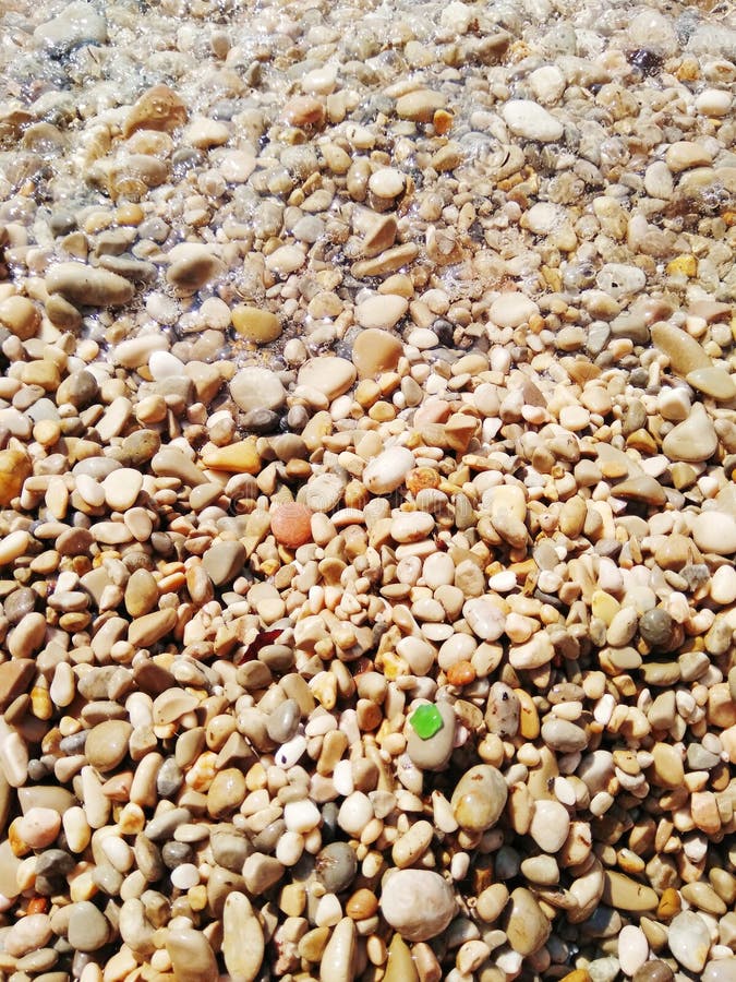 Small Yellow Pebbles on the Beach Stock Image - Image of small, beach ...