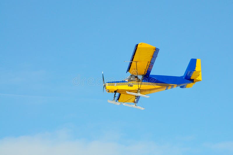 A Yellow Plane with a Propeller on the Blue Sky Editorial Stock Photo ...