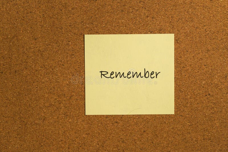 Small Yellow Sticky Note on Office Noticeboard Stock Photo - Image of ...
