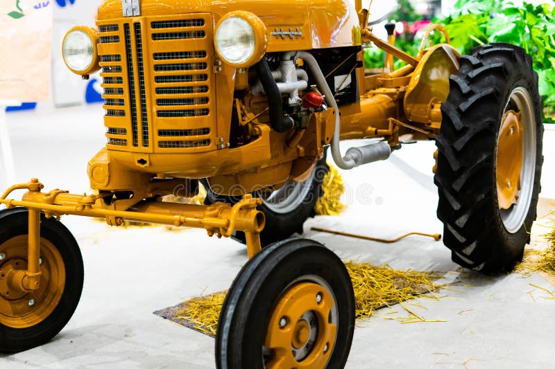 Small Yellow Tractor in Exhibition, Closeup Details, Wheels Stock Photo ...