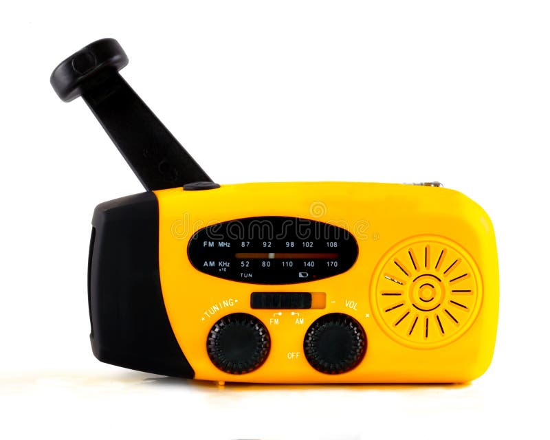 A Small Yellow Wind Up and Solar Powered Radio. Stock Photo - Image of ...