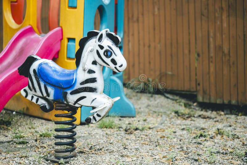 A Small Zebra Toy is Standing on a Toy Spring Tube Stock Image - Image ...