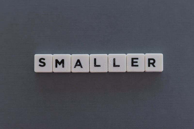 Smaller Word Made of Square Letter Word on Grey Background Stock Photo ...