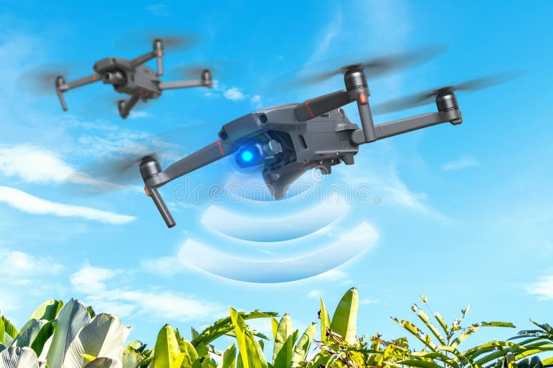 Drones Flying Over field stock photo. Image of outdoors - 151000790