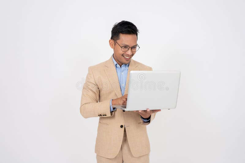 Smart Asian Businessman Planning a Project, Using His Tablet and ...