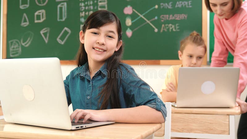 Smart Asian Girl Looking at Camera while Coding Engineering Prompt ...