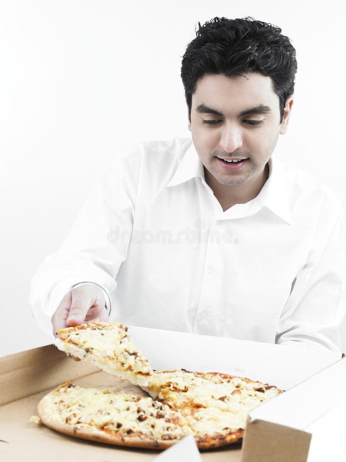 Asian man eating pizza stock image. Image of face, ethnicity - 7319751