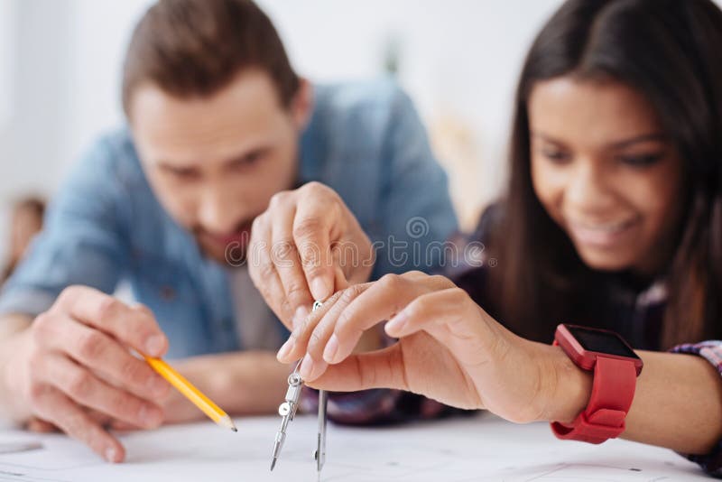 Smart Attentive Engineer Giving His Colleague Instructions Stock Image ...
