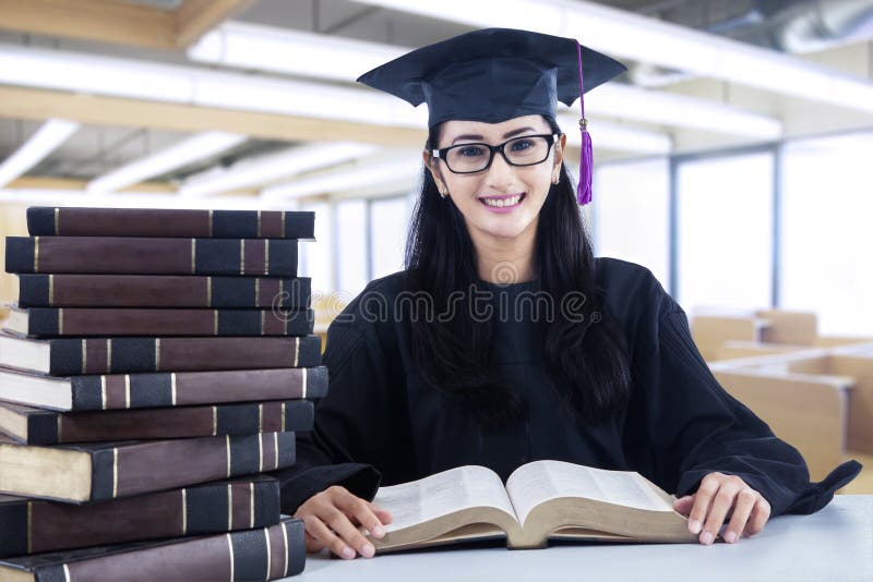 Smart bachelor in library stock image. Image of female - 76111183
