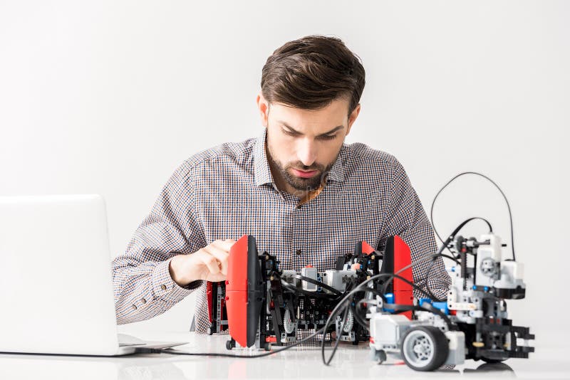 Smart Bearded Engineer Working with Gadget Stock Image - Image of ...