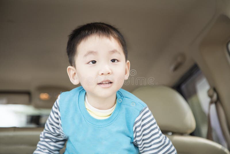 Smart boy in back of car stock image. Image of stand - 67358475