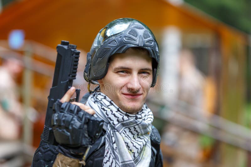 Smart Boy in Opened Mask with Paintball Handgun Stock Photo - Image of ...