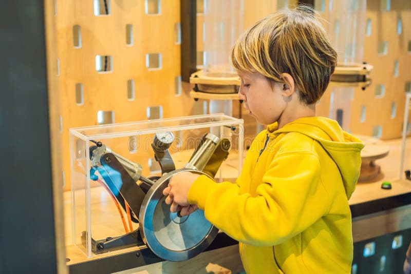 Smart Boy Scientist Making Physical Experiments in the Laboratory ...