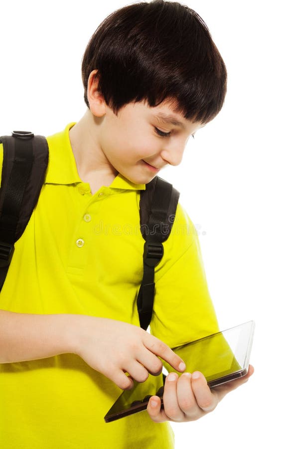 Boy using tablet computer stock photo. Image of backpack - 30293496