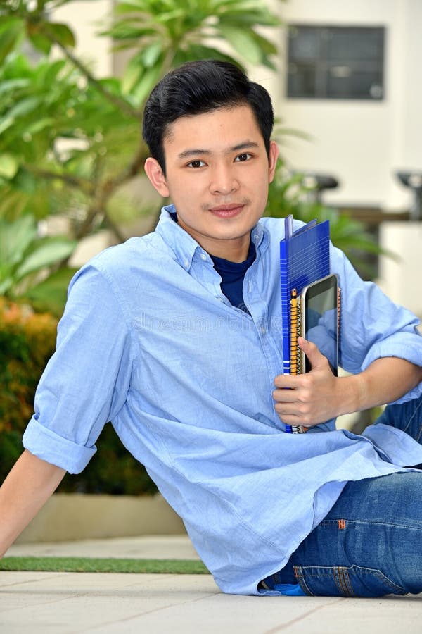 Smart Boy Student Sitting on Campus Stock Photo - Image of wisdom ...