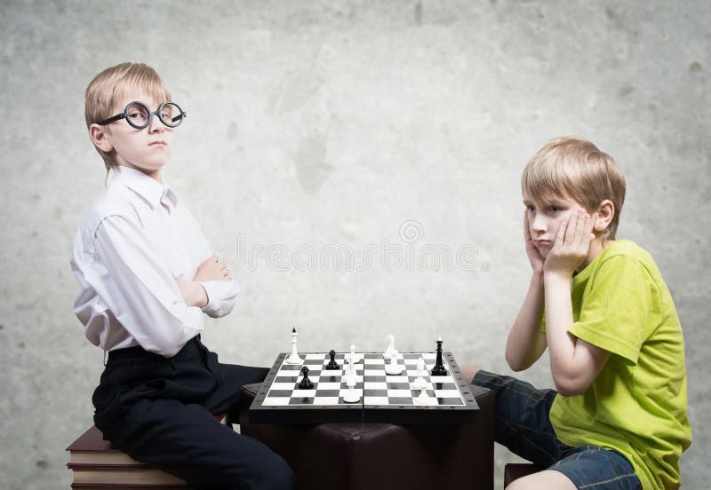 Smart boy vs stupid boy stock photo. Image of chess, funny - 47728218