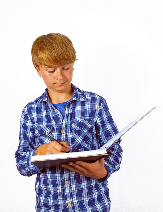 Smart Boy is Writing into a Book Stock Photo - Image of portrait, cute ...