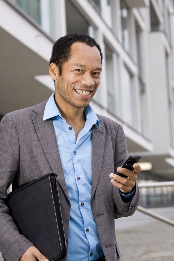 Smart Business Male with Mobile Outside Stock Photo - Image of afro ...