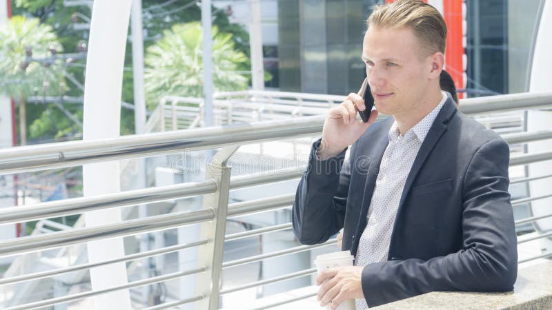 Smart Business Man Hold the Smartphone and Talk Stock Image - Image of ...