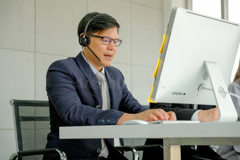 Smart Business Man Work As Operator or Call Center of the Company and ...