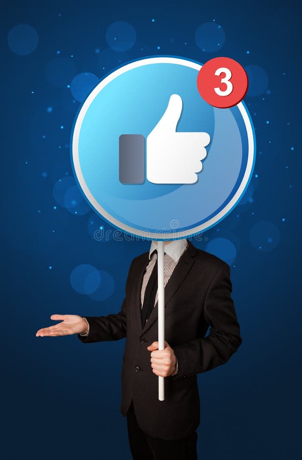 Businessman Holding Facebook Sign Stock Photo - Image of like, person ...