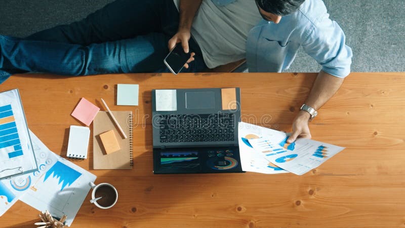Smart Businessman Looking at Phone while Sit and Put Leg on Table ...